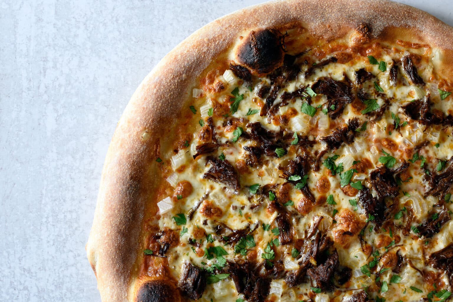 Authentic Birria Pizza Recipe - Pala Pizza Ovens